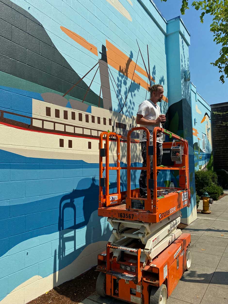Local artist Craig Johnson paints new mural on side of Bartell Drugs in ...